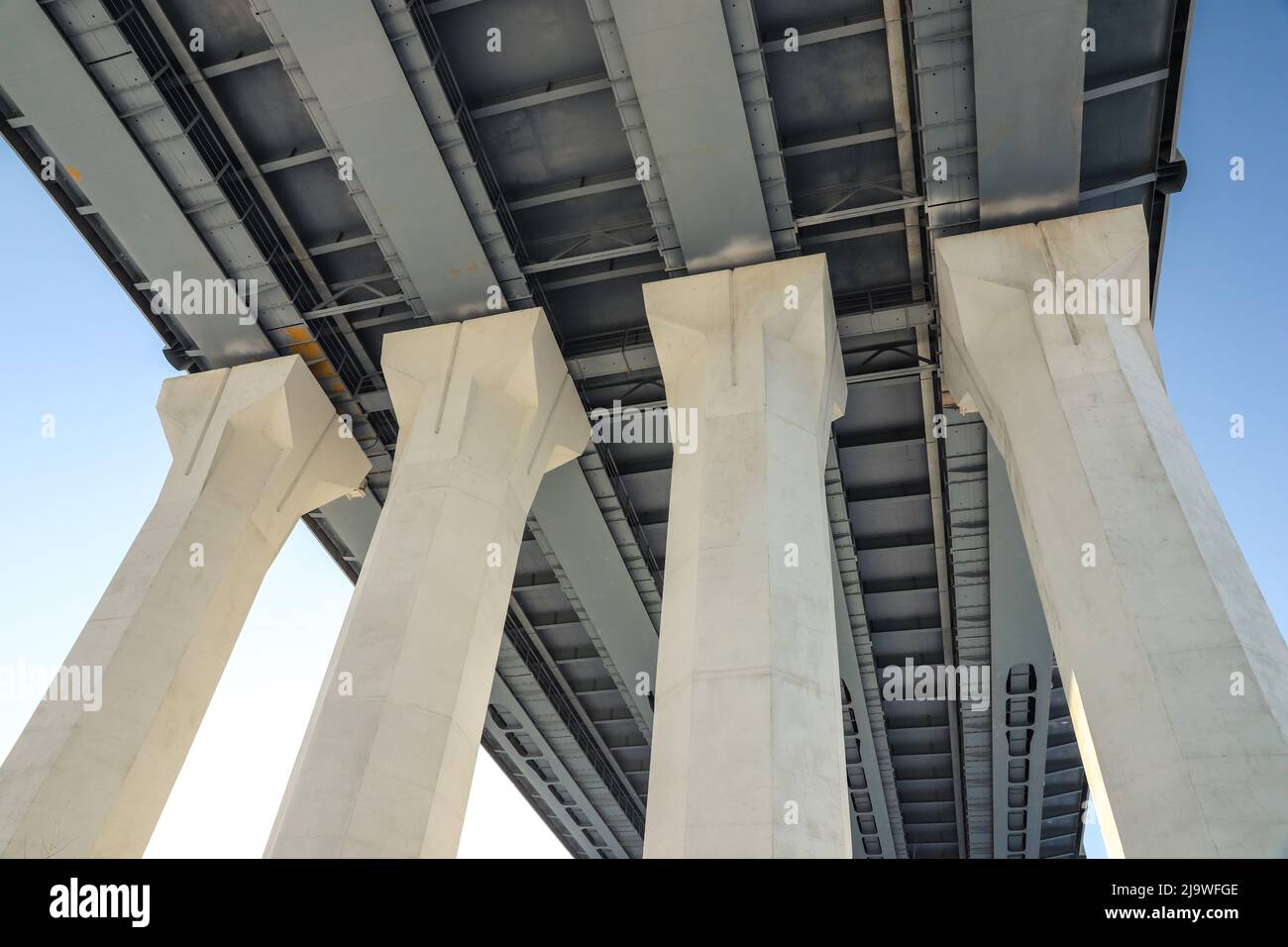 Four road bridge supports close-up. Engineering and architecture ...