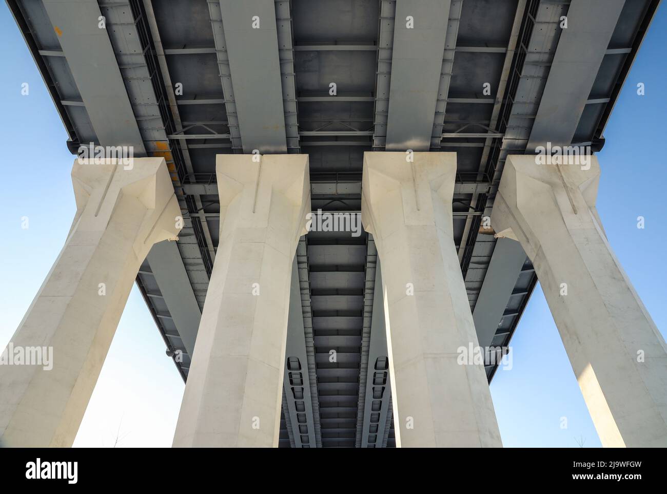 Four road bridge supports close-up. Engineering and architecture ...