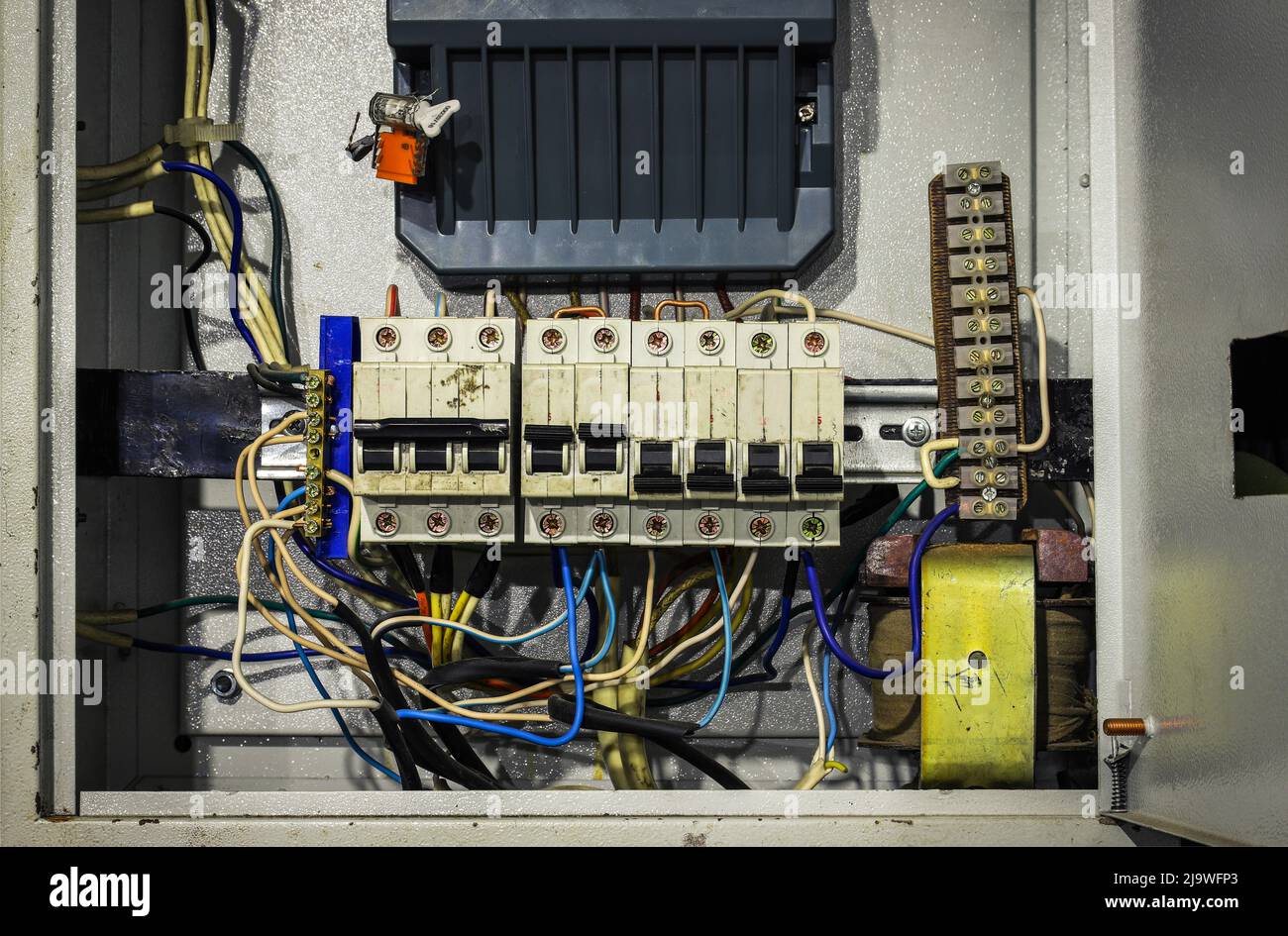 Cable chaos in electric control panel close-up. Tangled wires. Circuit ...