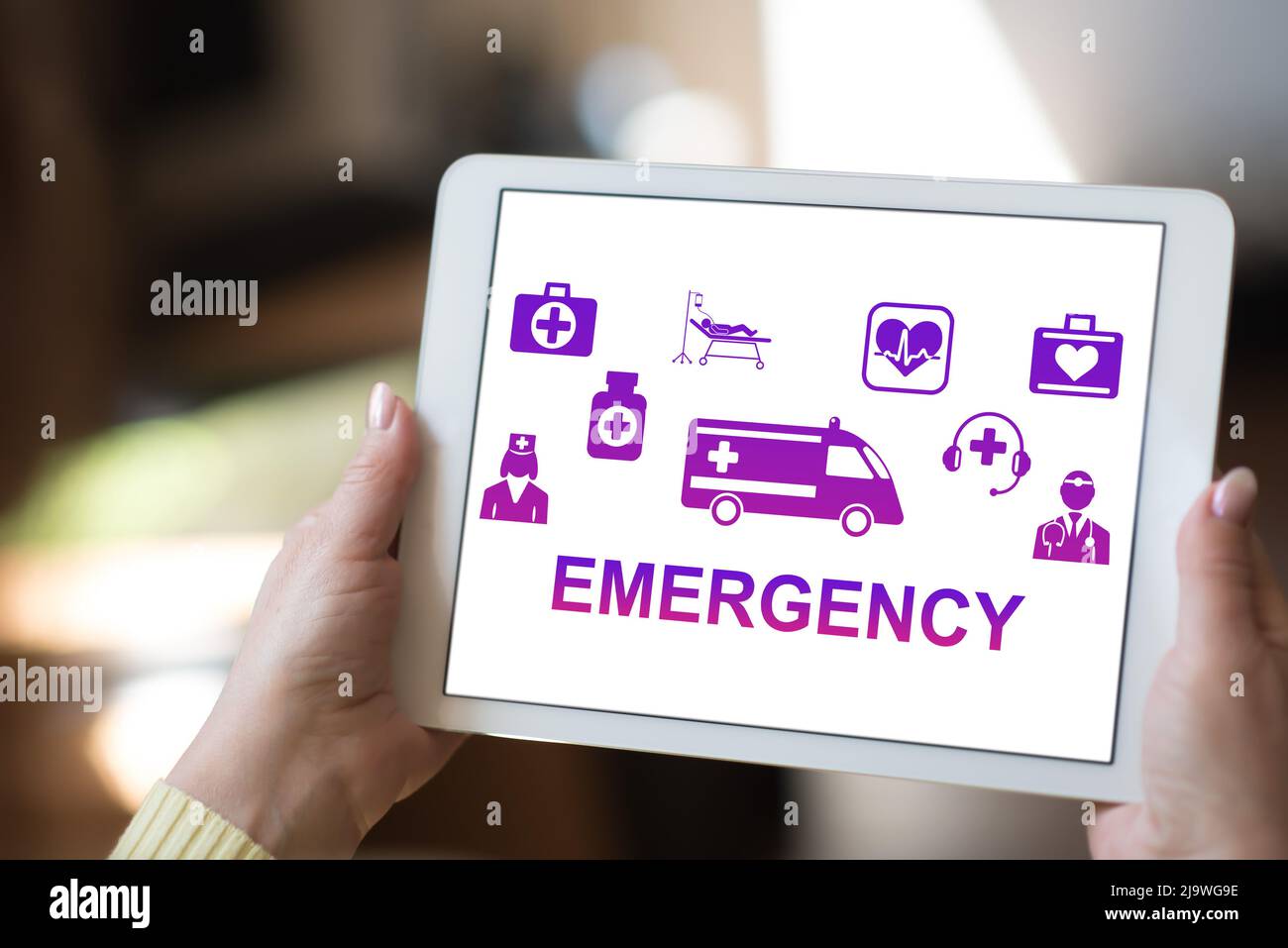 Tablet screen displaying an emergency concept Stock Photo - Alamy