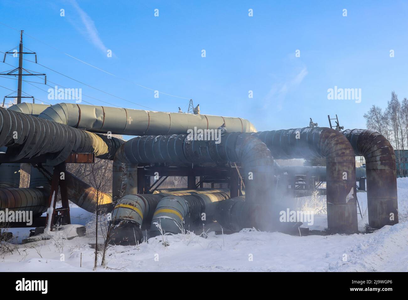 Old heating pipes in cold winter close-up Stock Photo - Alamy