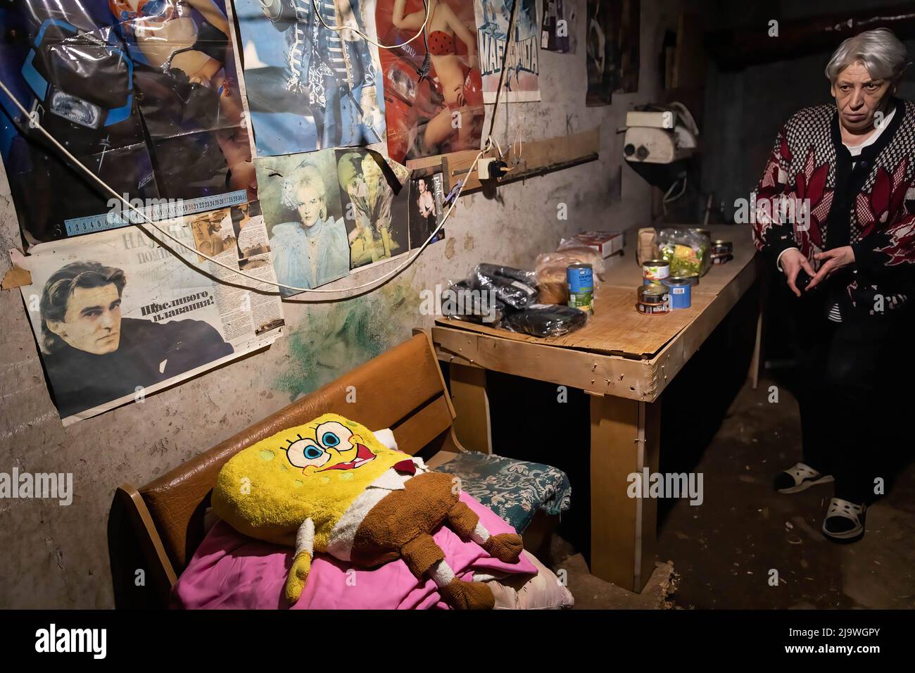 A view of an underground bunker wall with decorations of people who ...