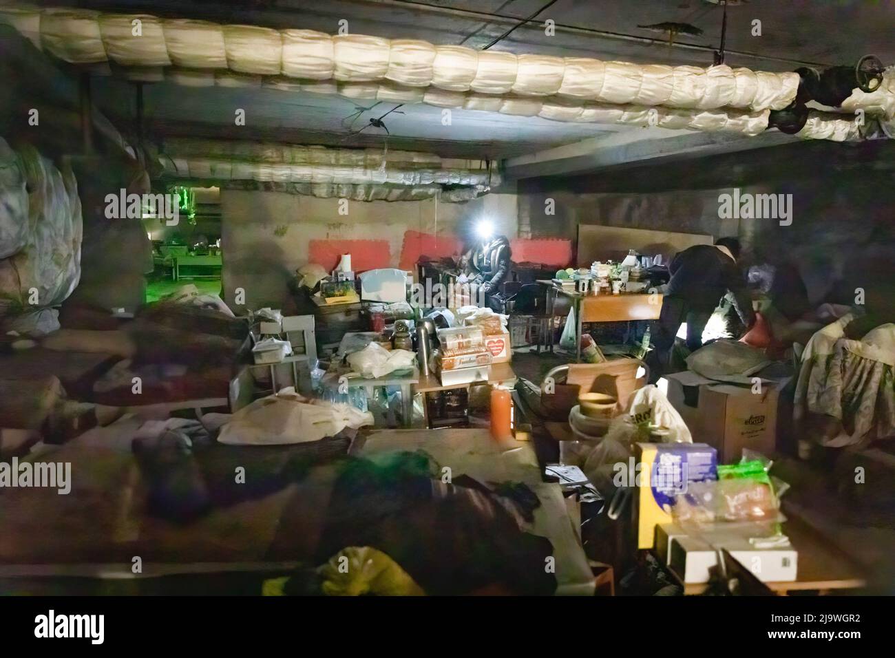 The interior view of the sleeping area in an underground bunker in ...