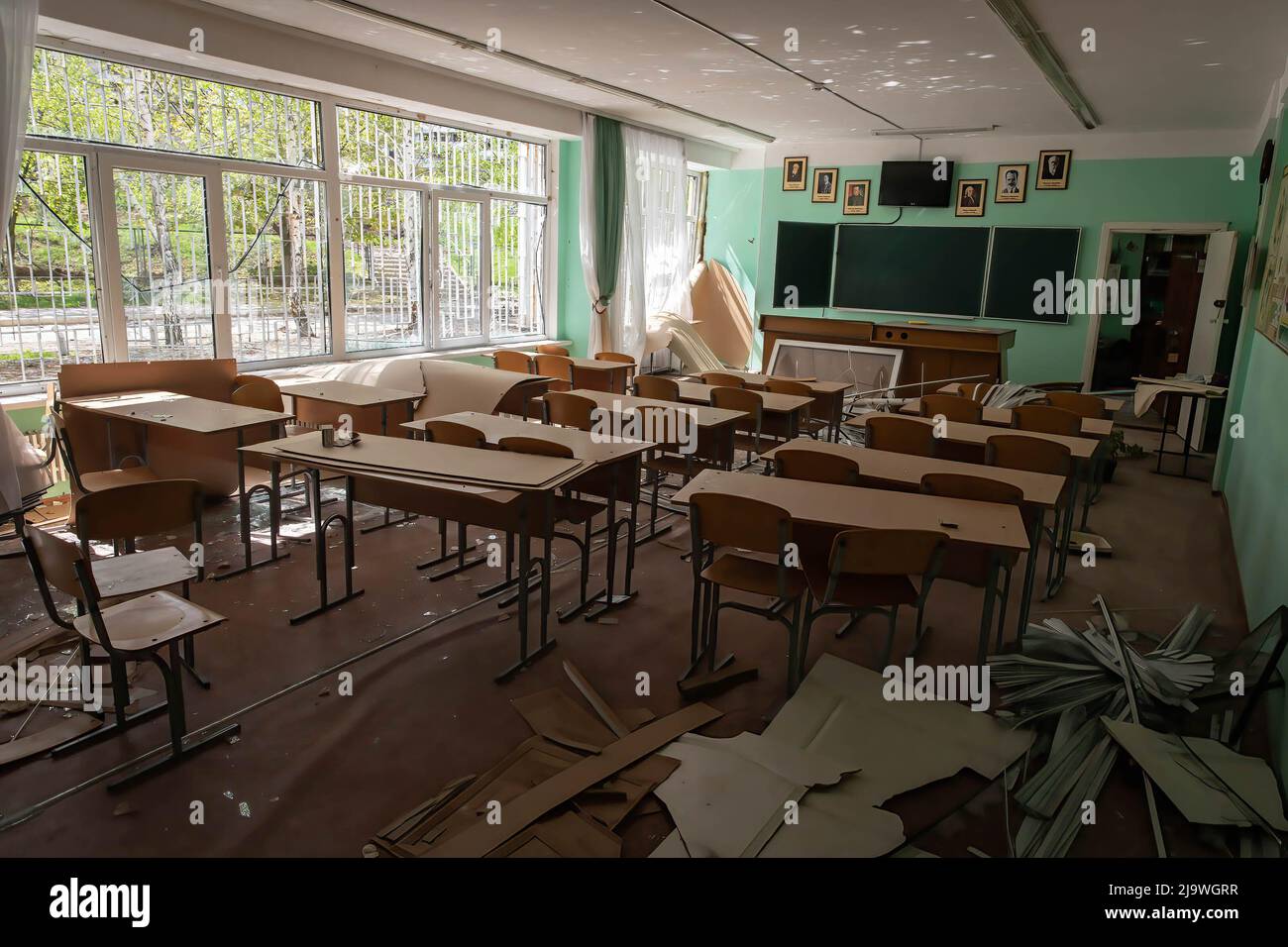A classroom damaged by shelling can be seen in a school in Kharkiv. A ...