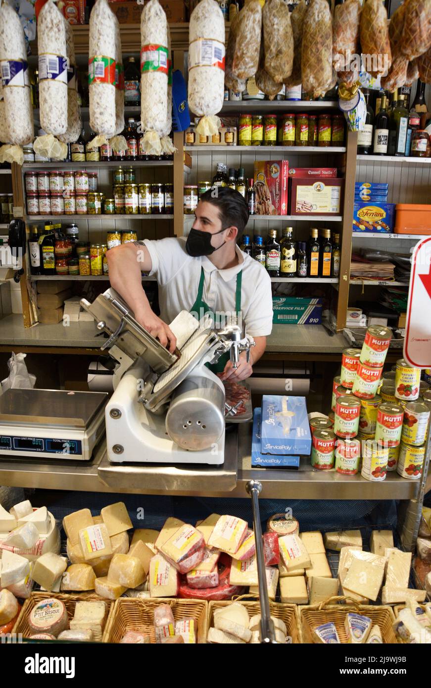 An employee makes sandwiches at the landmark Italian-American deli ...