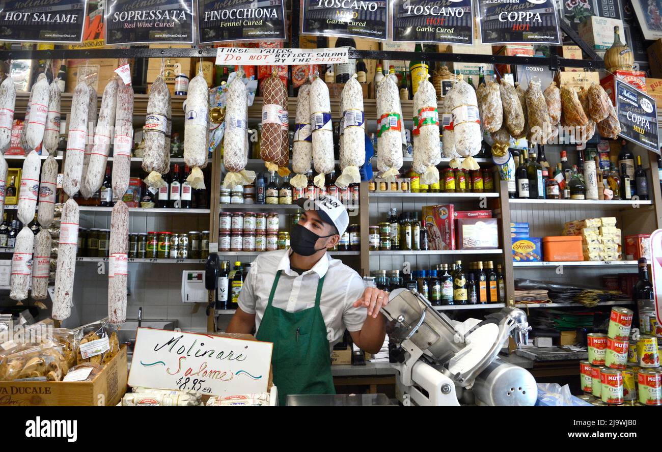 An employee makes sandwiches at the landmark Italian-American deli ...