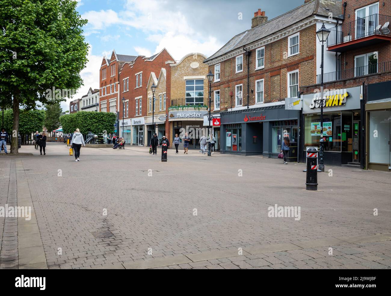 Shoppers on a sunny day in Staines upon Thames, West Sussex Stock Photo ...