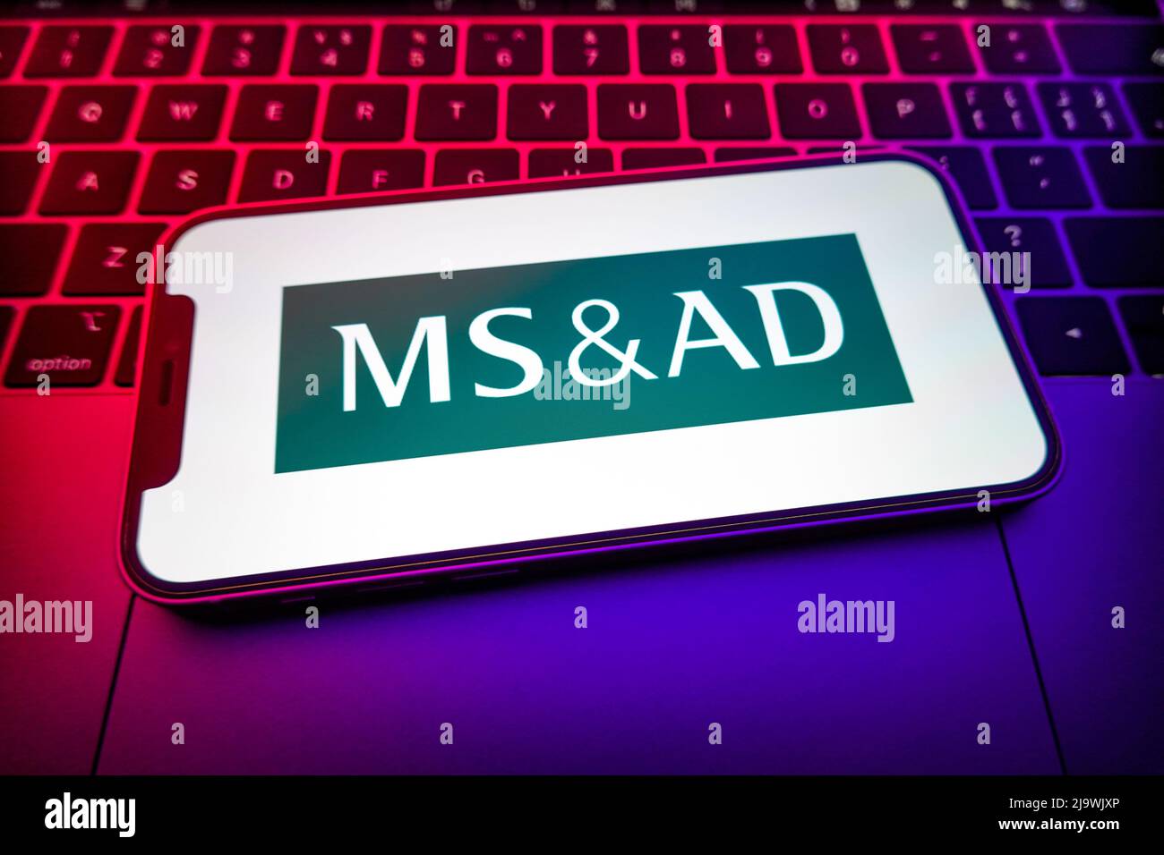 In this photo illustration, the logo of MS&AD Insurance Group is displayed on the screen of a ...