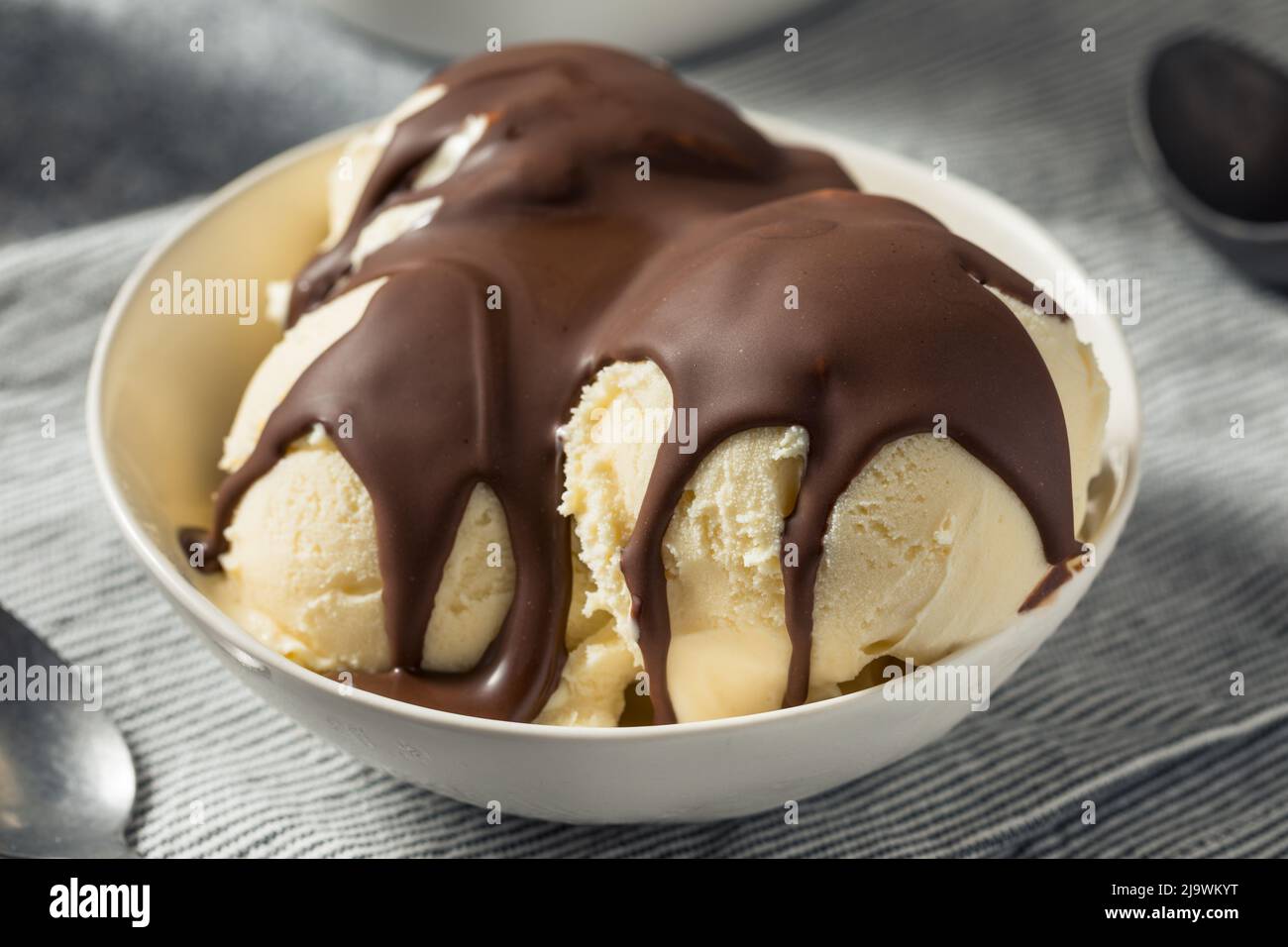 Sweet Hard Chocolate Shell Ice Cream Sundae in a Bowl Stock Photo - Alamy