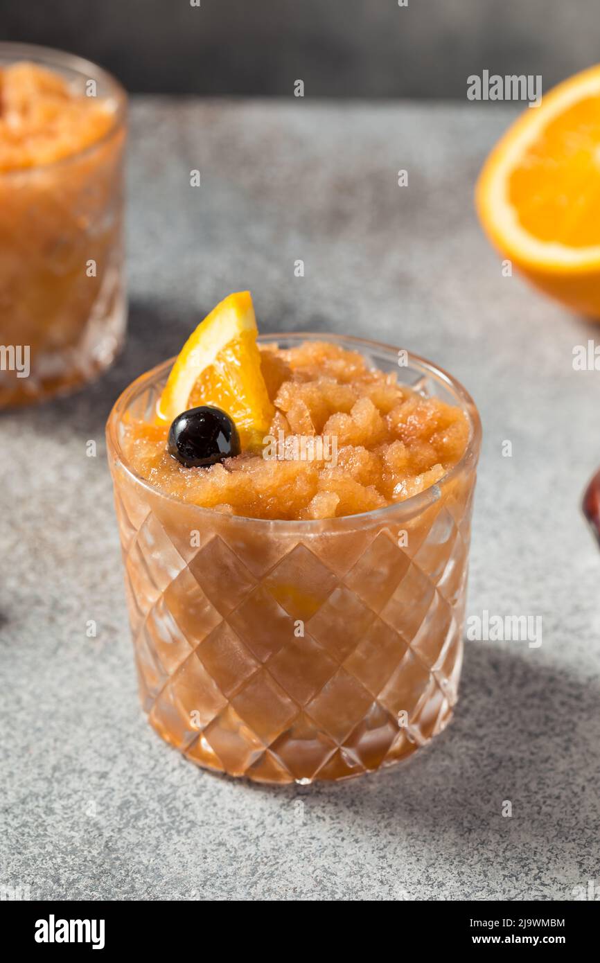 Boozy Frozen Old Fashioned Slushy with Orange and Bourbon Stock Photo ...