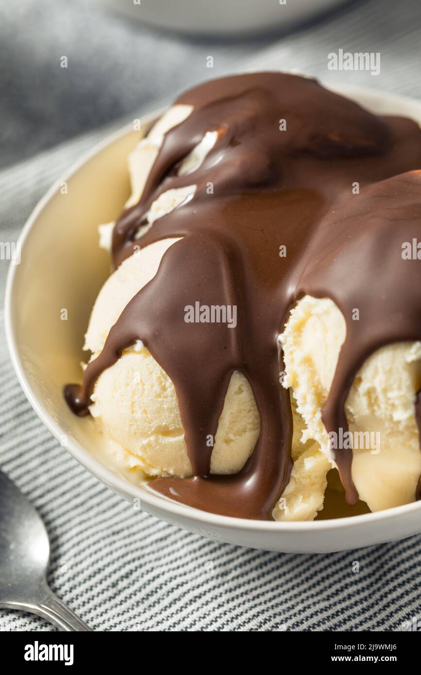 Sweet Hard Chocolate Shell Ice Cream Sundae in a Bowl Stock Photo - Alamy