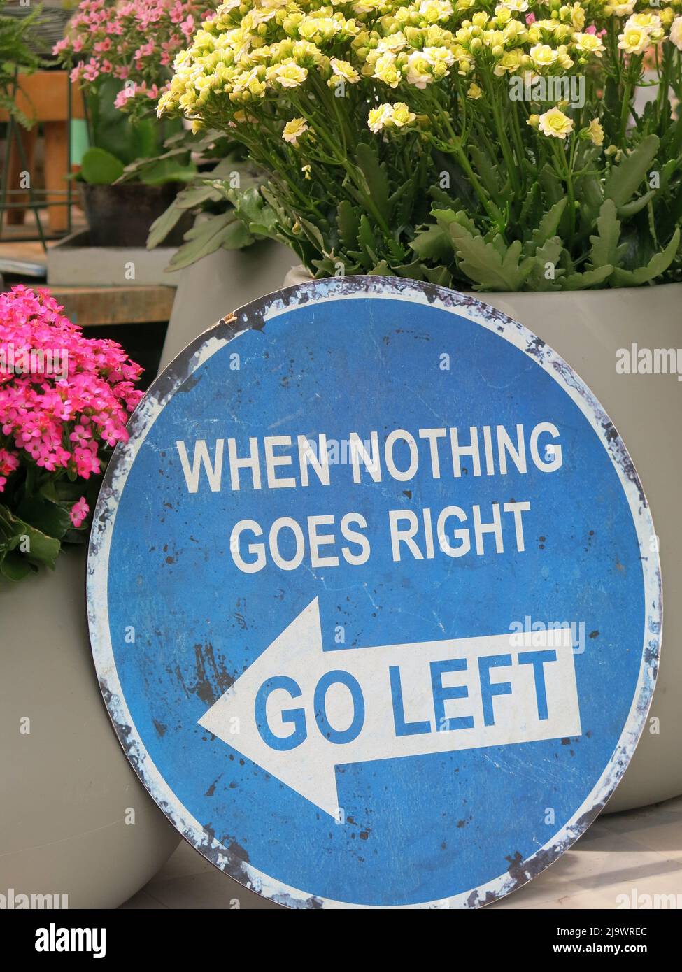 Changing direction: Amusing sign "When Nothing Goes Right, Go Left ...