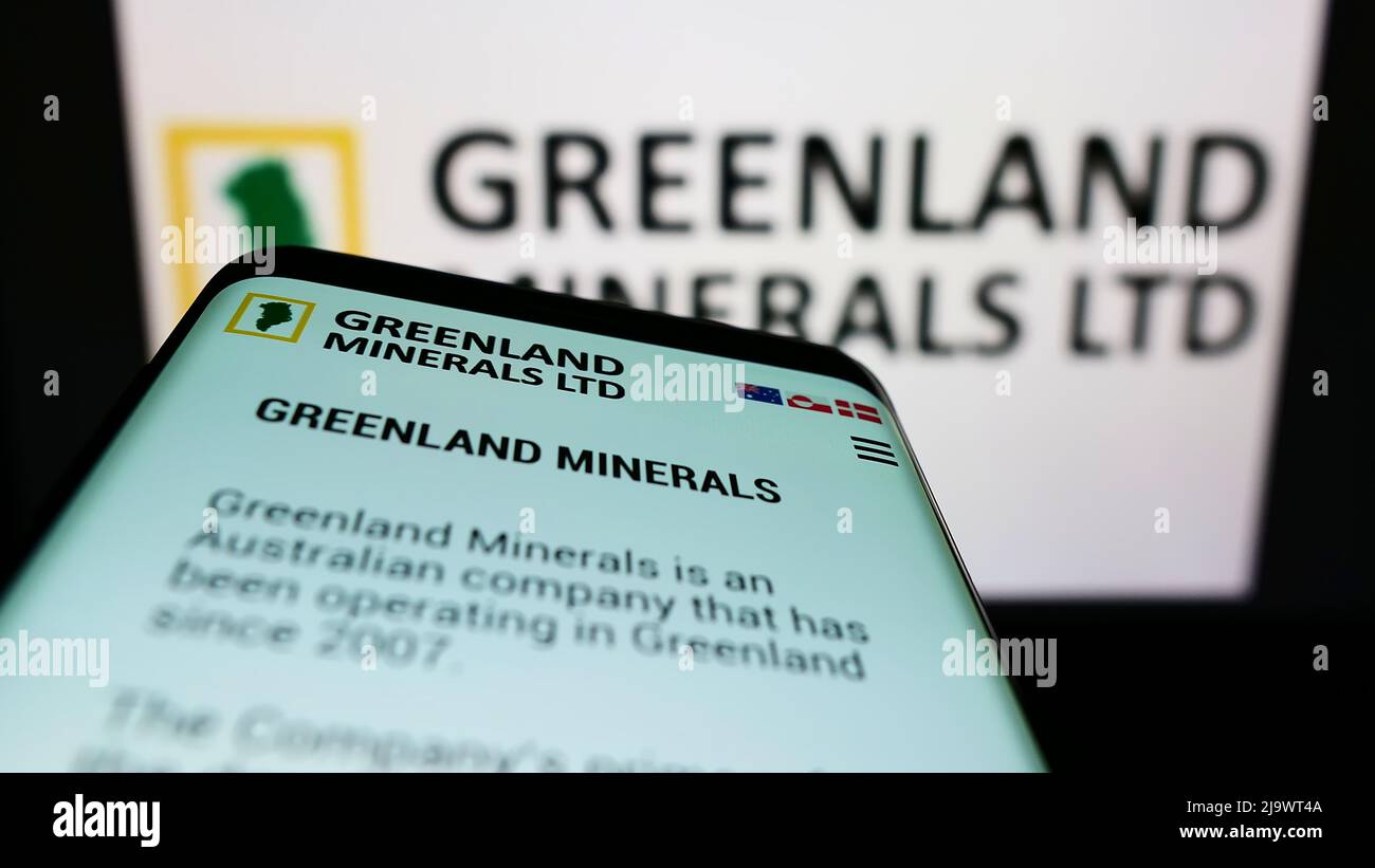 Mobile phone with webpage of mining company Greenland Minerals Limited ...