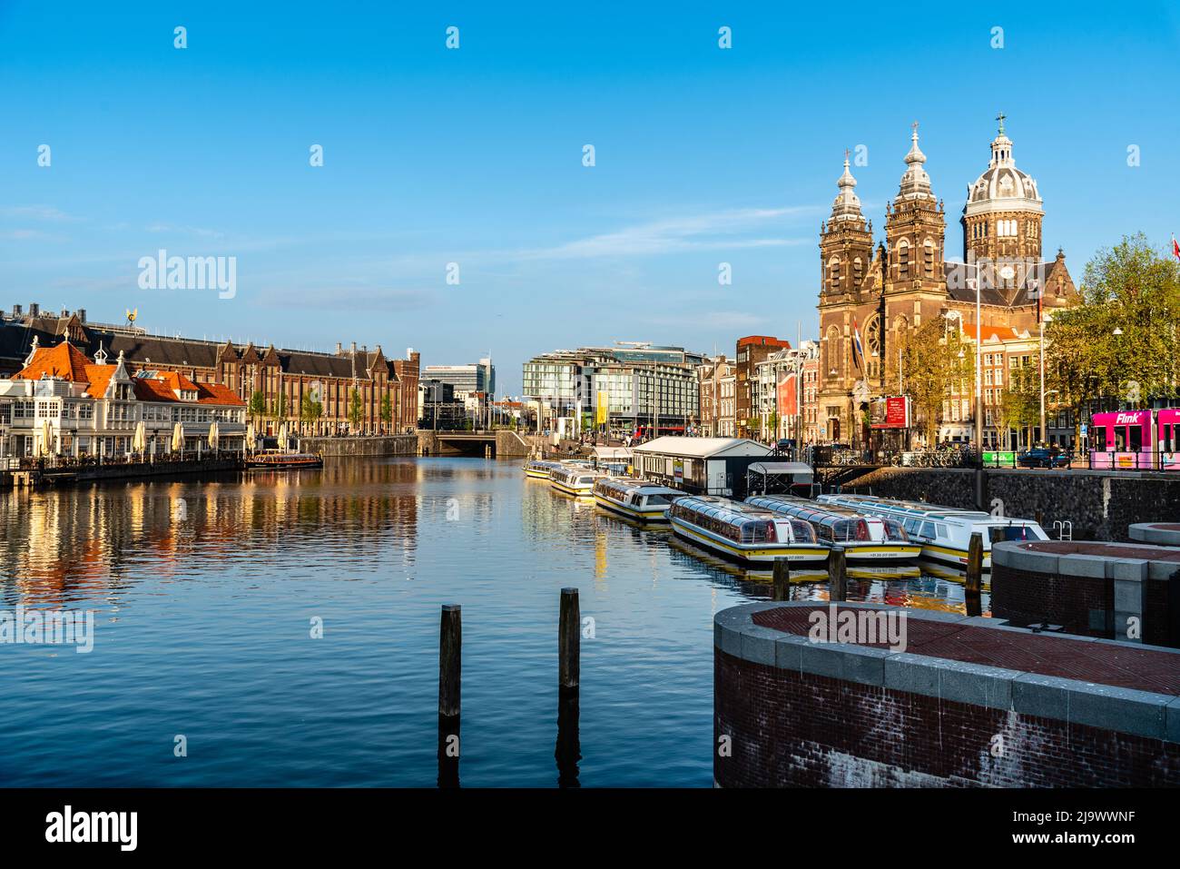 Amsterdam, Netherlands - May 5, 2022: Central Station and canal Stock ...