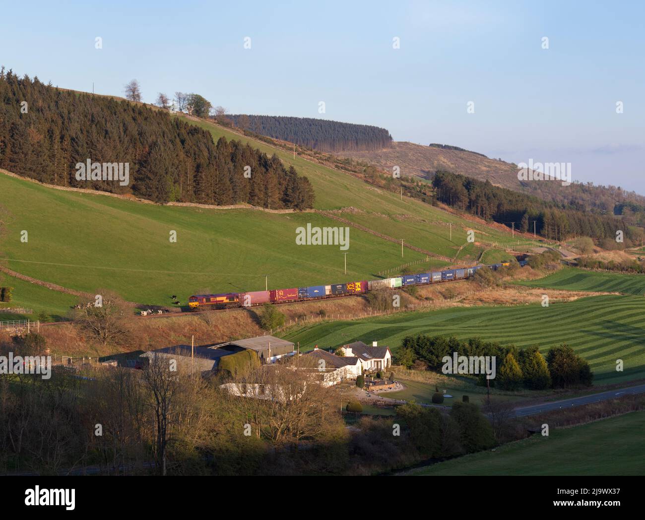 DB Cargo class 66 diesel locomotive 66164 hauling an intermodal ...
