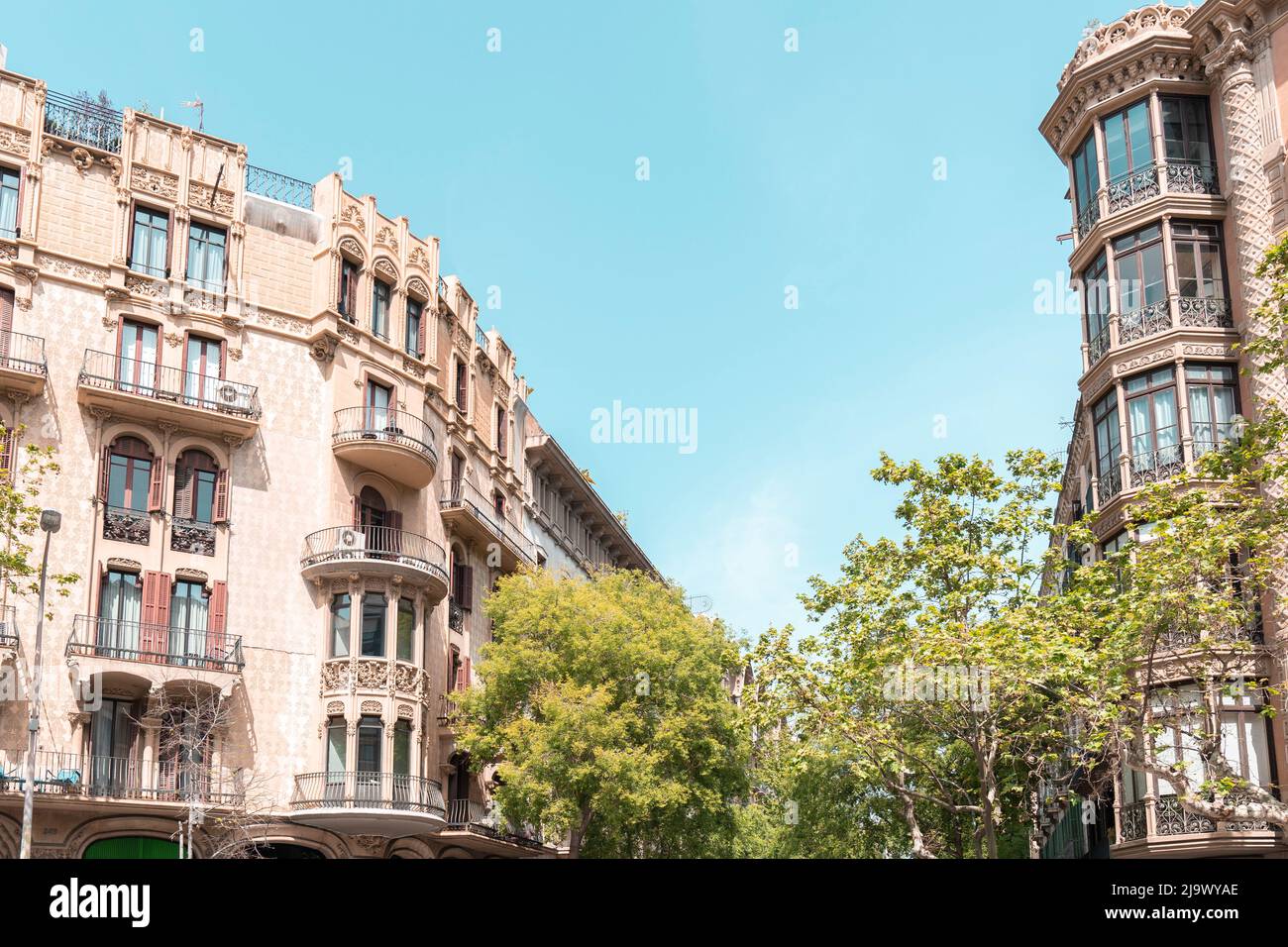 Classic apartment building with balconies and shutters in Barcelona ...