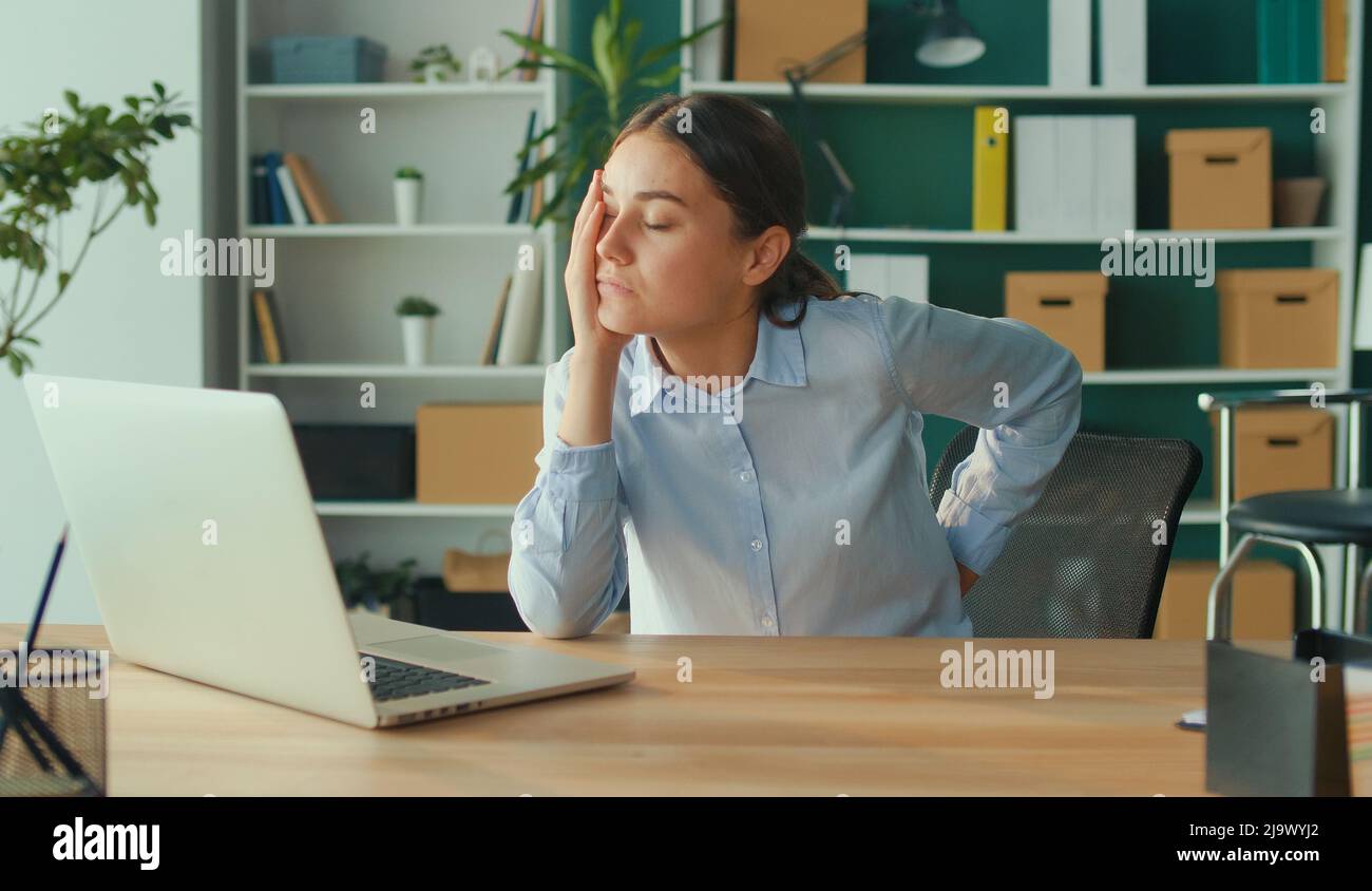 Woman Trying to Get Up From the Table Suddenly Feeling Pain in Back ...