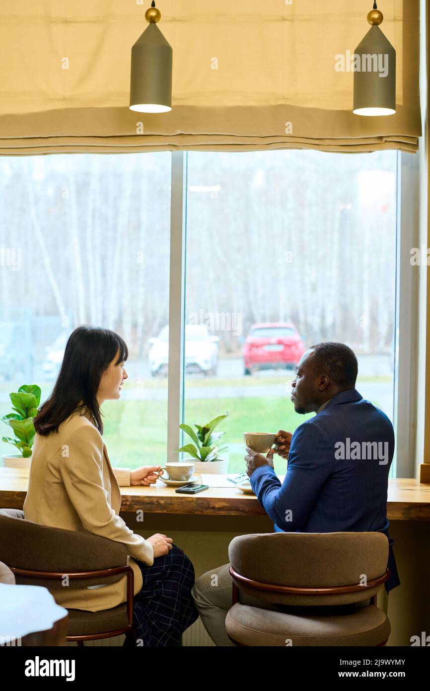 Professional coffee shop meeting hi-res stock photography and images ...