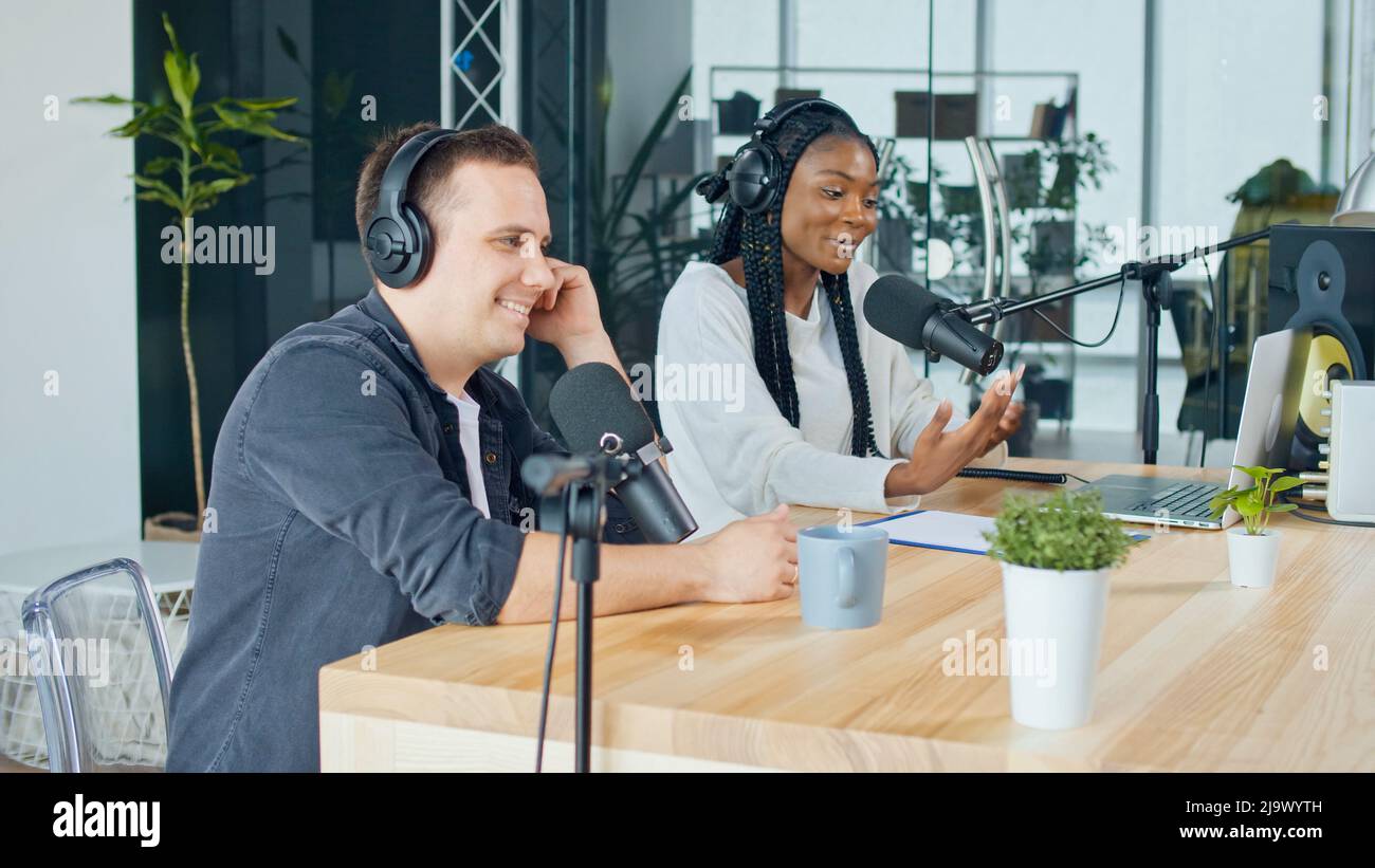 Broadcasts a Live Radio Interview With Spbd. Male Host Sharing Content ...