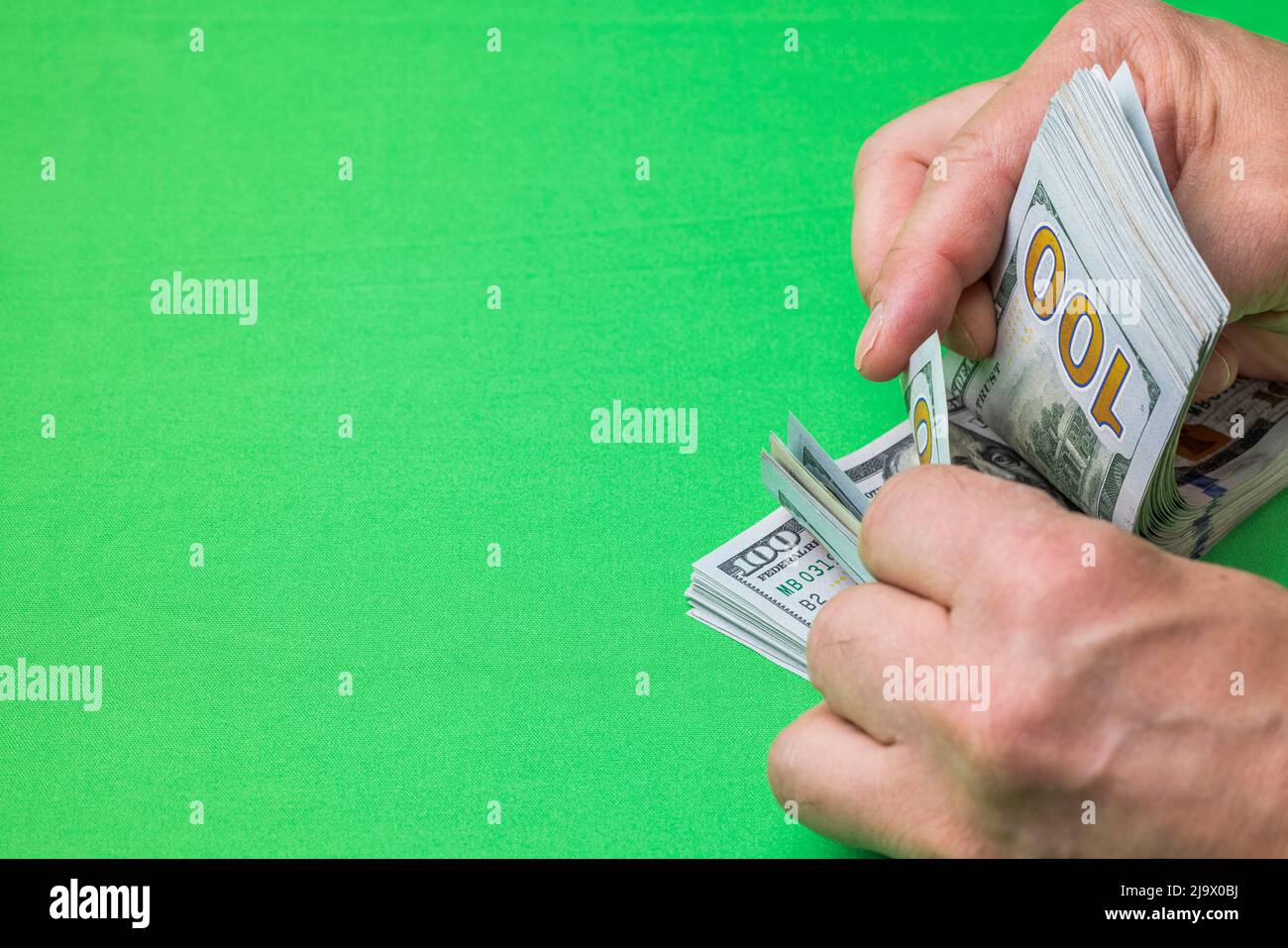 Mans hands counting dollar banknotes hi-res stock photography and ...