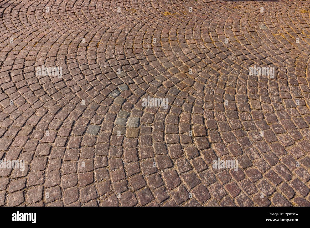 Beautiful view of paved pavement with old cobblestones. Texture of ...