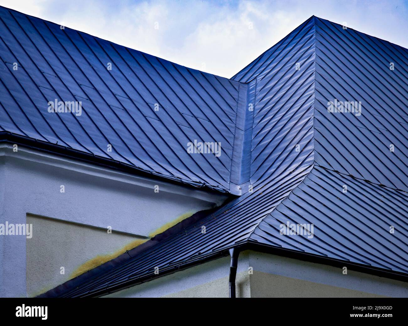 architectural detail indented blue metal roof Stock Photo - Alamy