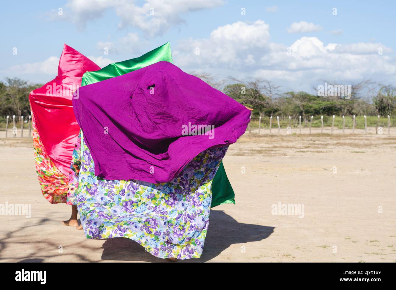 Women with colorful capes dancing typical Wayuu dance. Indigenous ...