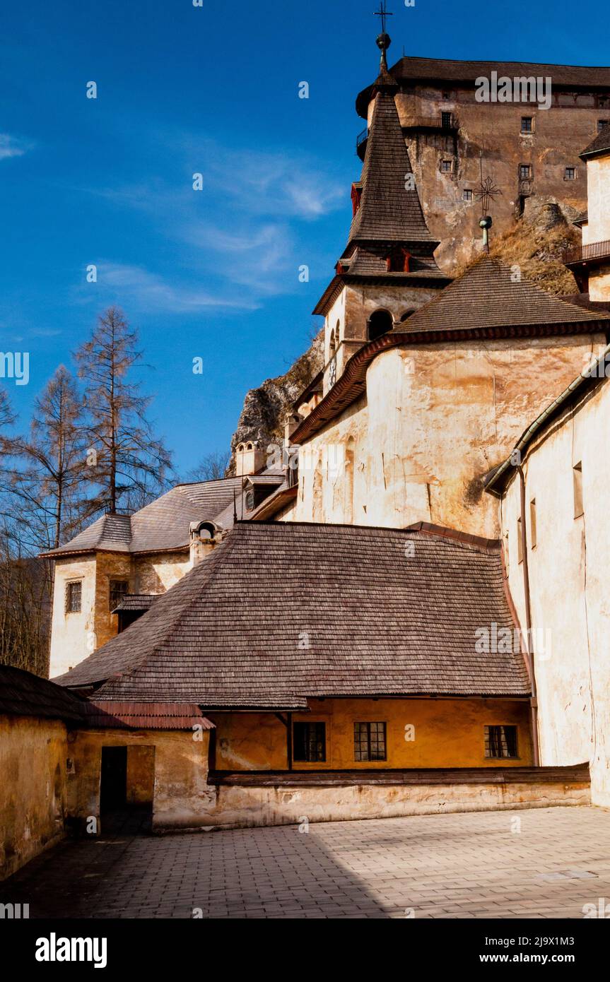 Pointed spire and hipped roof of Neo-Gothic Orava Castle in Slovakia ...