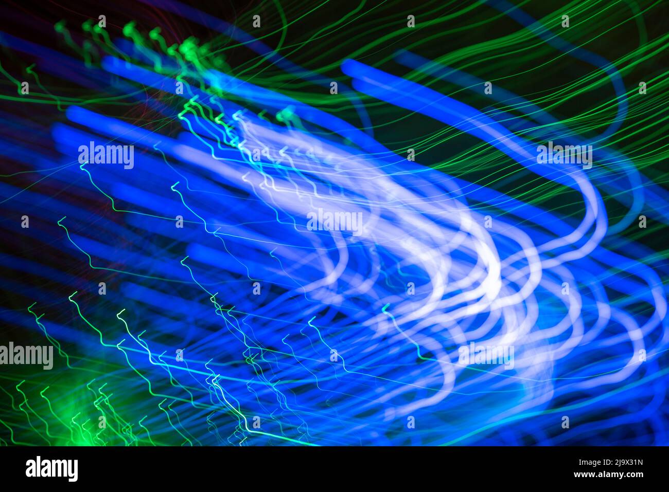 Colorful psychedelic lights and shadows in a dazzling stream of diverse ...