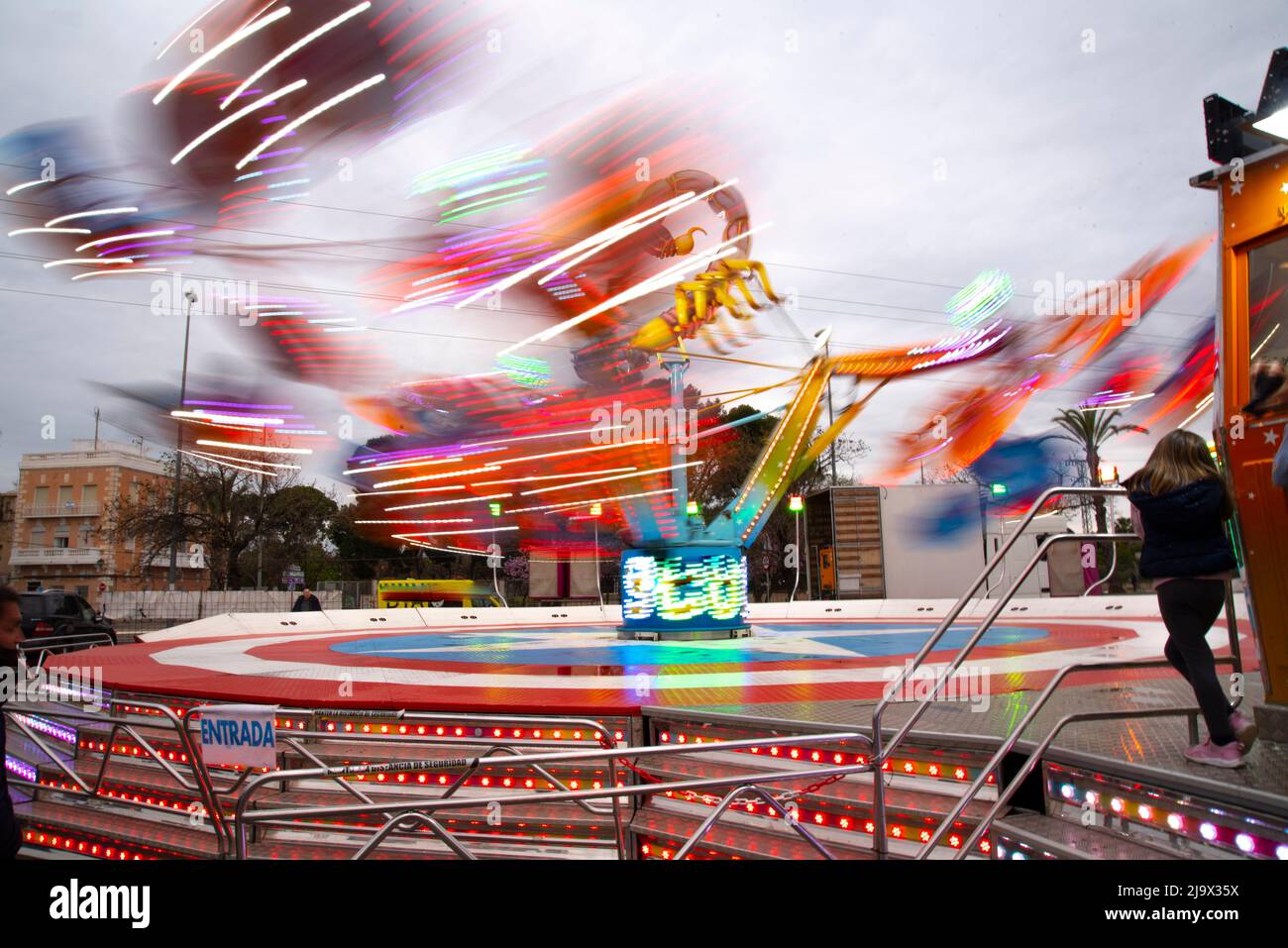 Hilarious fairground attractions, with lights of different colors ...