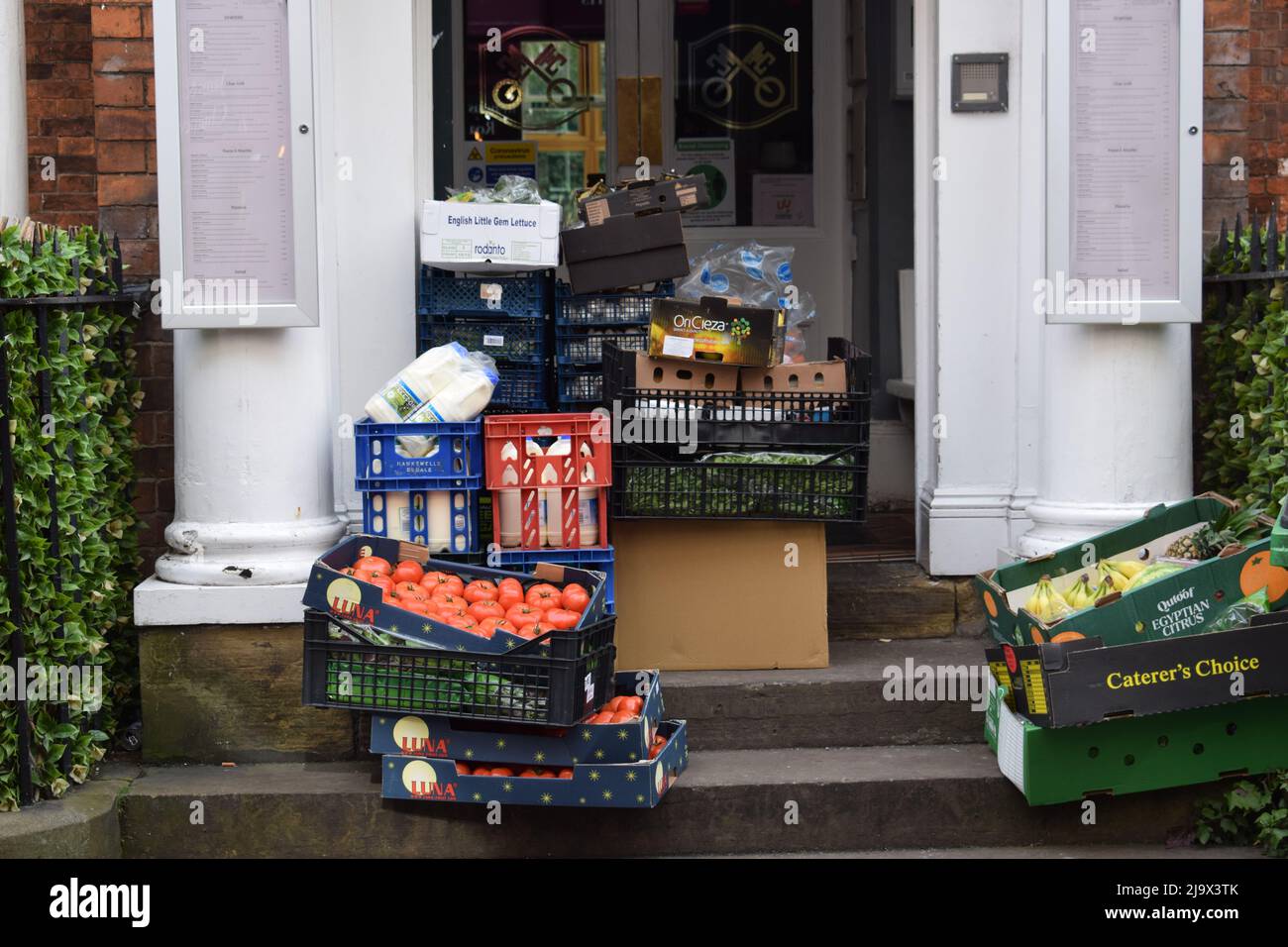 Fresh produce delivery storefront boxes shop Stock Photo - Alamy