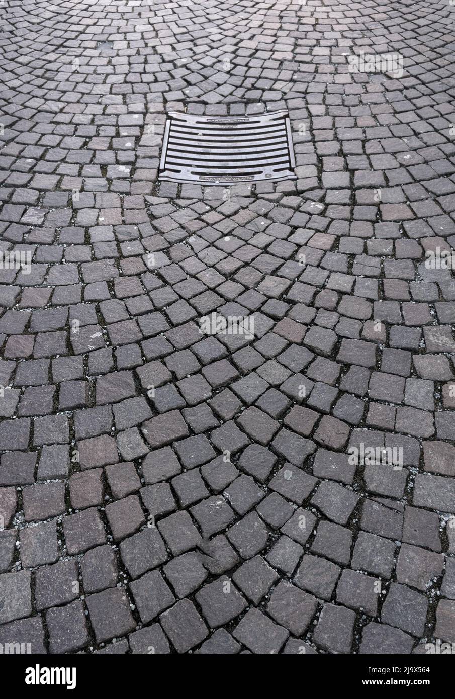 Granite cobblestoned pavement background texture Stock Photo - Alamy