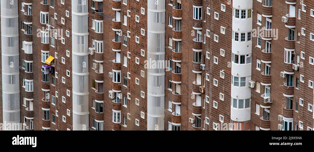 Swarm of houses in a huge urban building Conglomerate of windows and ...