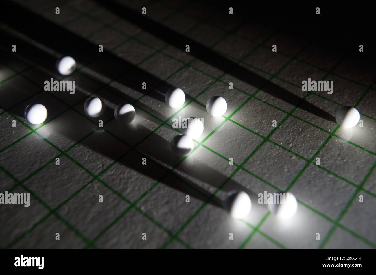 Balls in Light and Shadow Stock Photo - Alamy