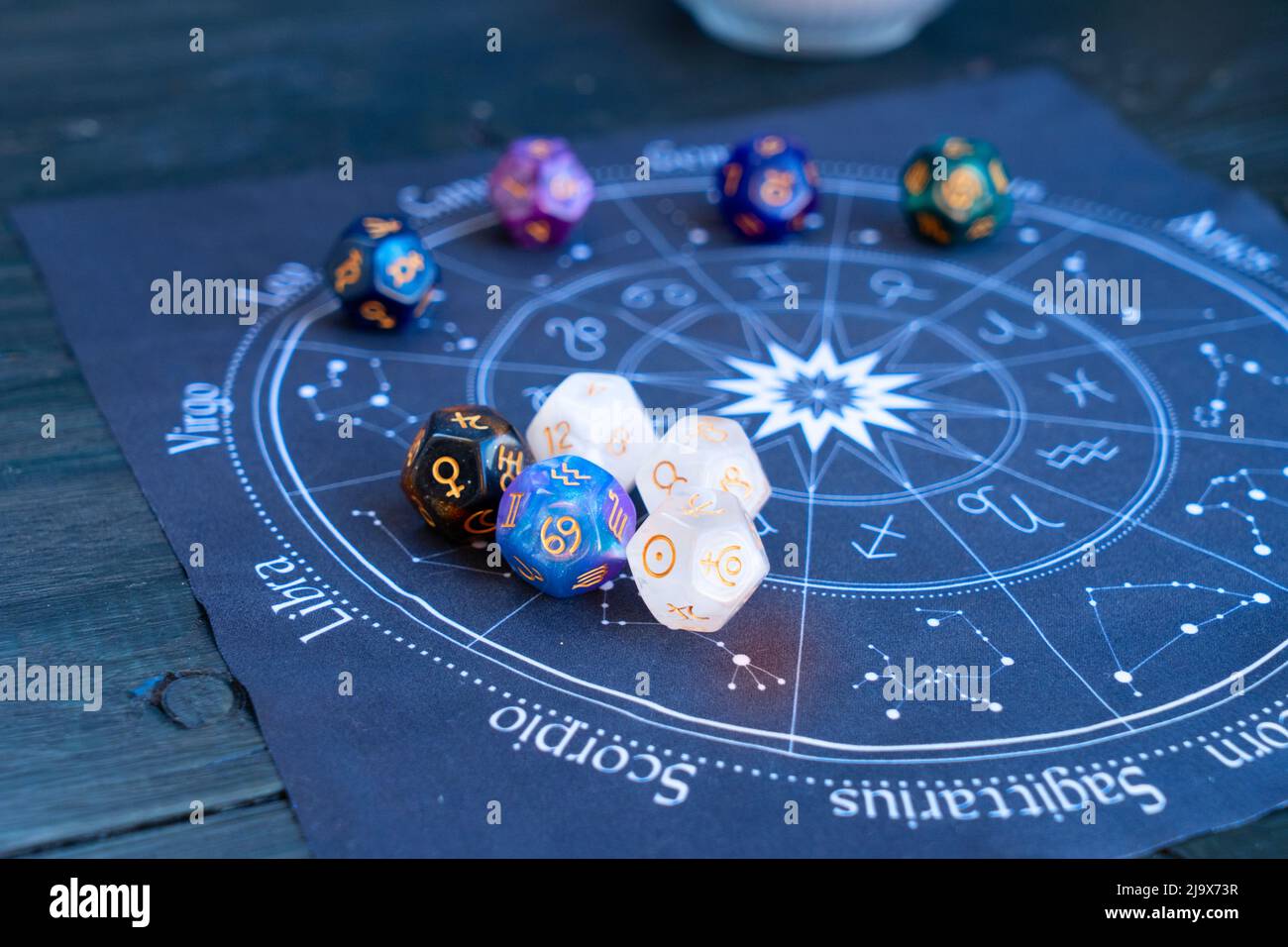 Zodiac horoscope with divination dice Stock Photo - Alamy