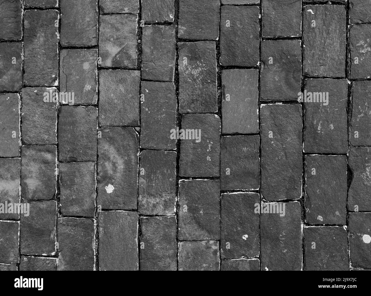 Dark paving stone roadway texture Stock Photo - Alamy