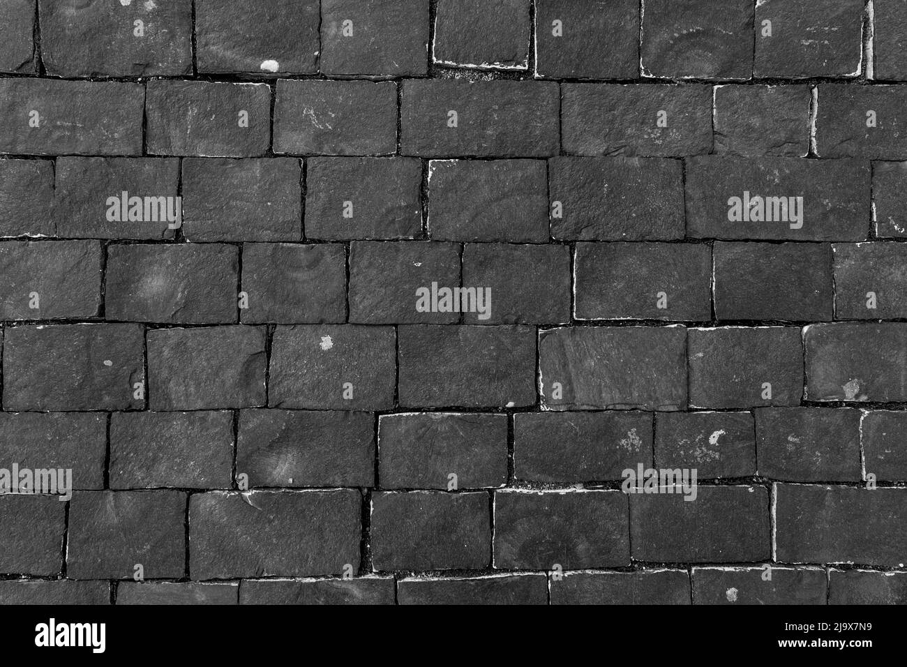 Dark paving stone roadway texture Stock Photo - Alamy