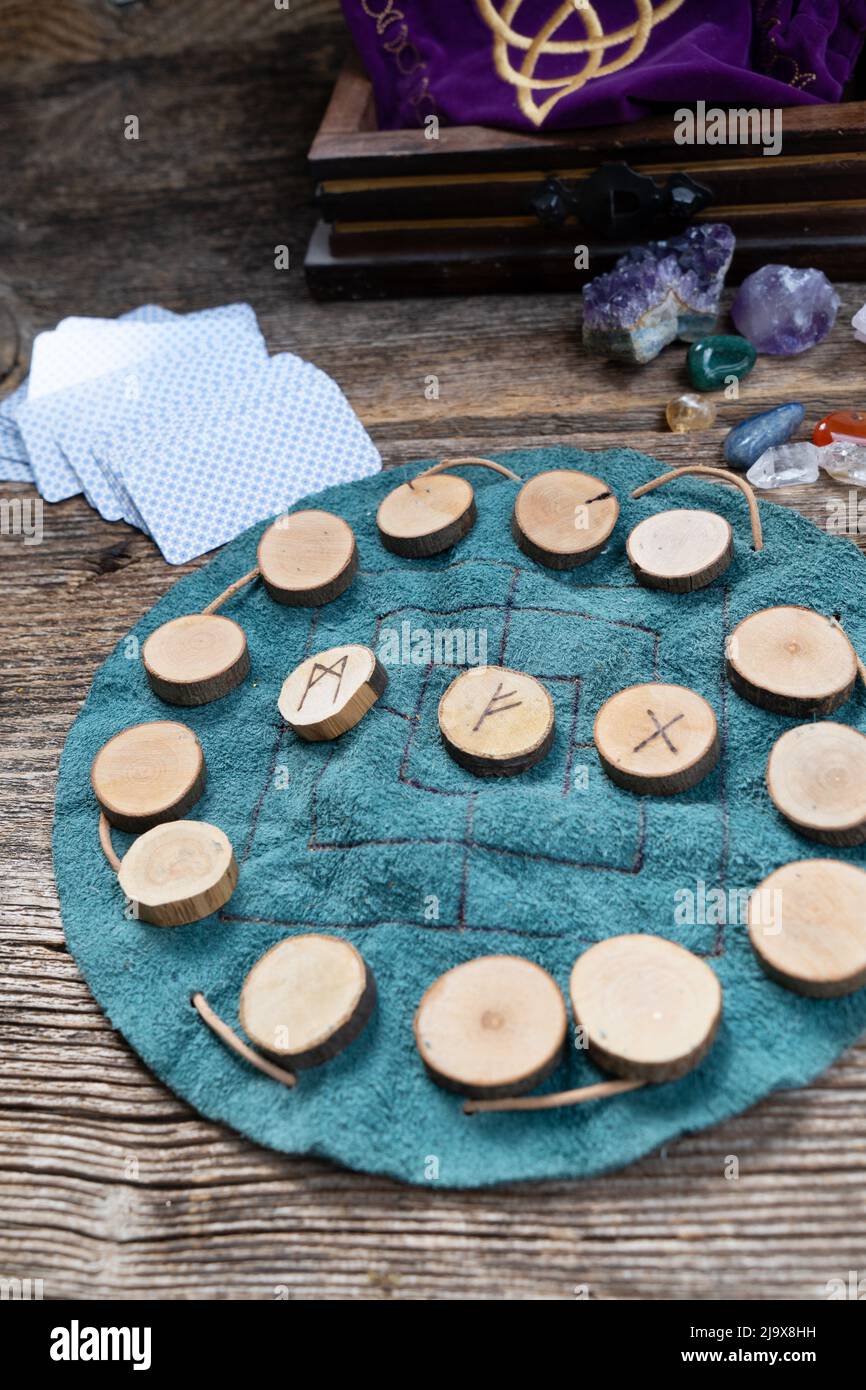 Handmade runes for fortunetelling Stock Photo - Alamy