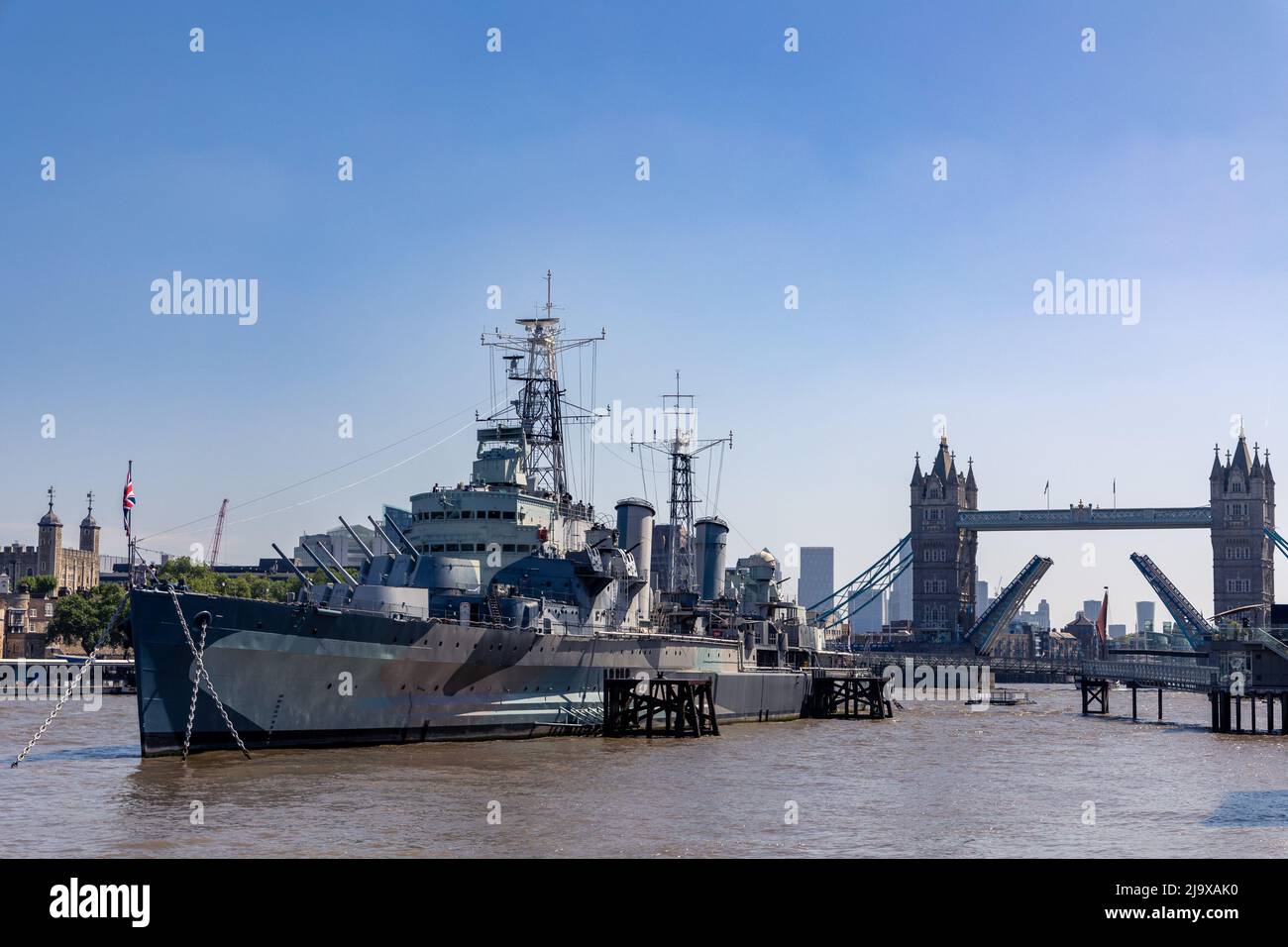 Tower Bridge of London and HMS warship Stock Photo - Alamy