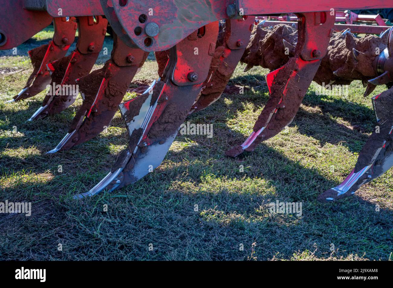 Used chisel plough for agricultural machine on the ground Stock Photo ...