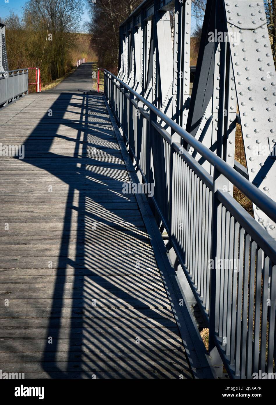 background Early evening shadow over the iron bridge Stock Photo - Alamy