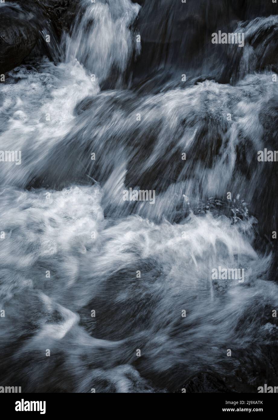 abstract background or texture details waves on the wild river Stock ...