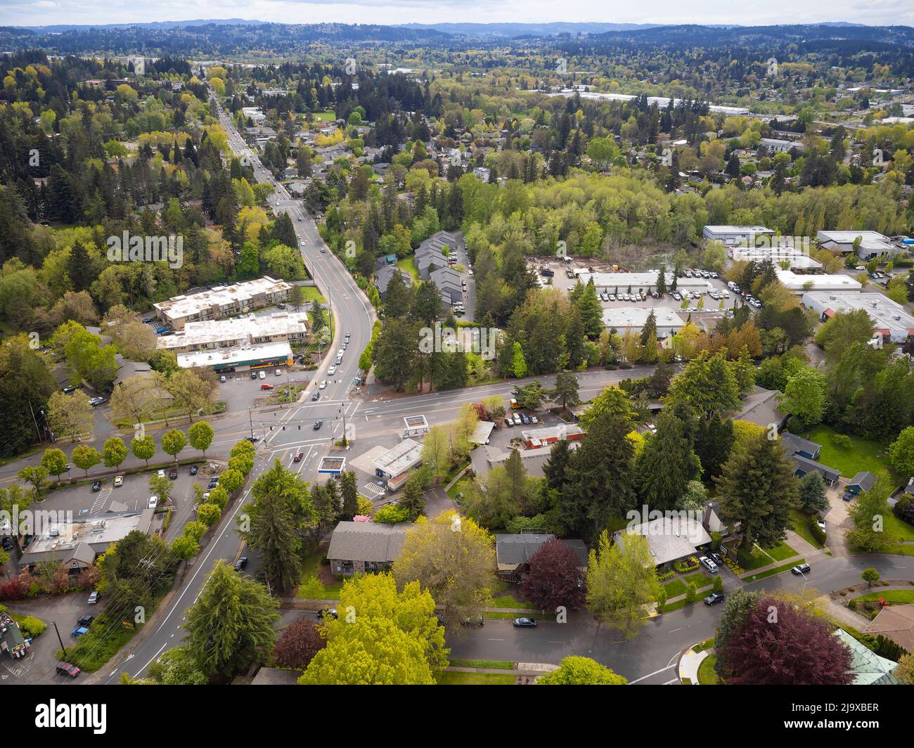 Drone shot. Cozy green town, suburb with developed infrastructure. A ...