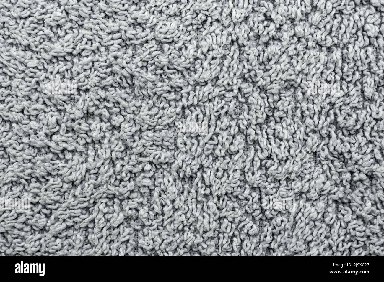 The texture of the gray color carpet close-up. Thick pile material ...