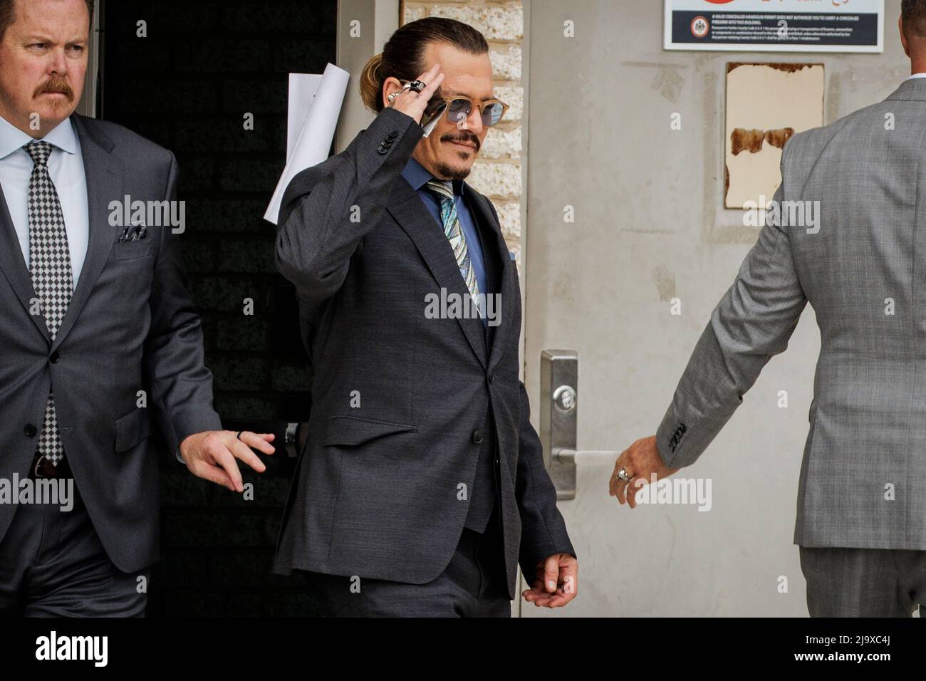 Fairfax, United States. 25th May, 2022. U.S. actor Johnny Depp salutes ...