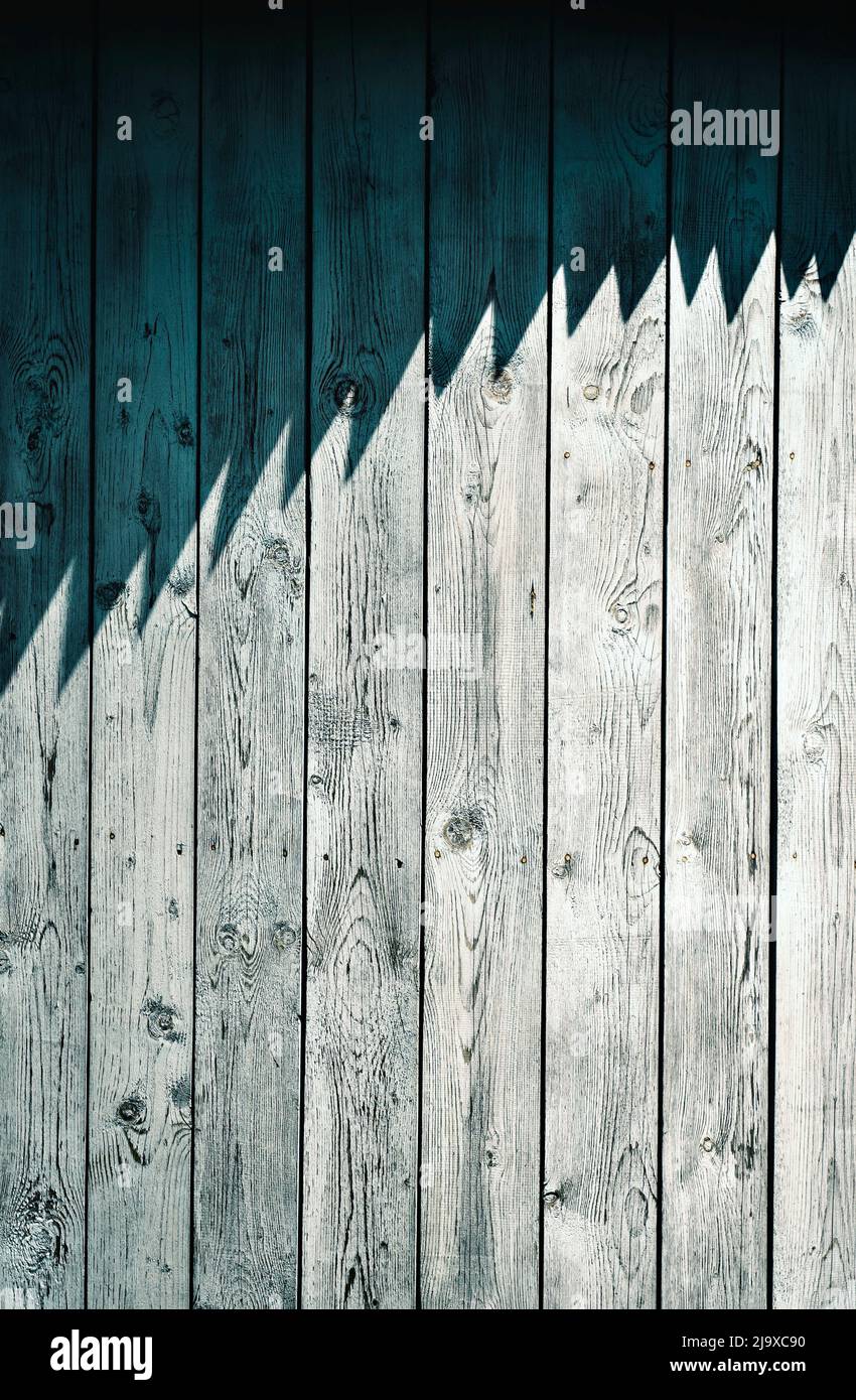 abstract background or texture Jagged shade on wooden cladding Stock ...