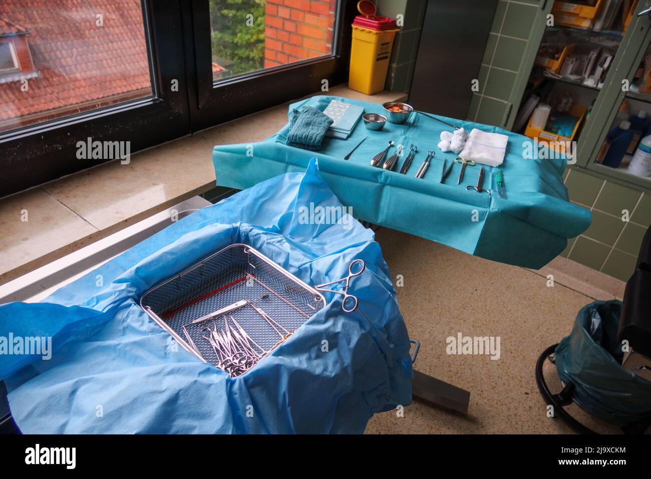 sterile instruments for performing small operation are placed on an ...