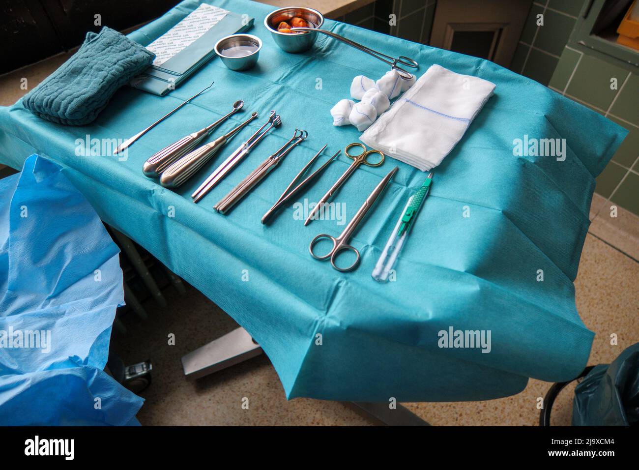 sterile instruments for performing small operation are placed on an ...