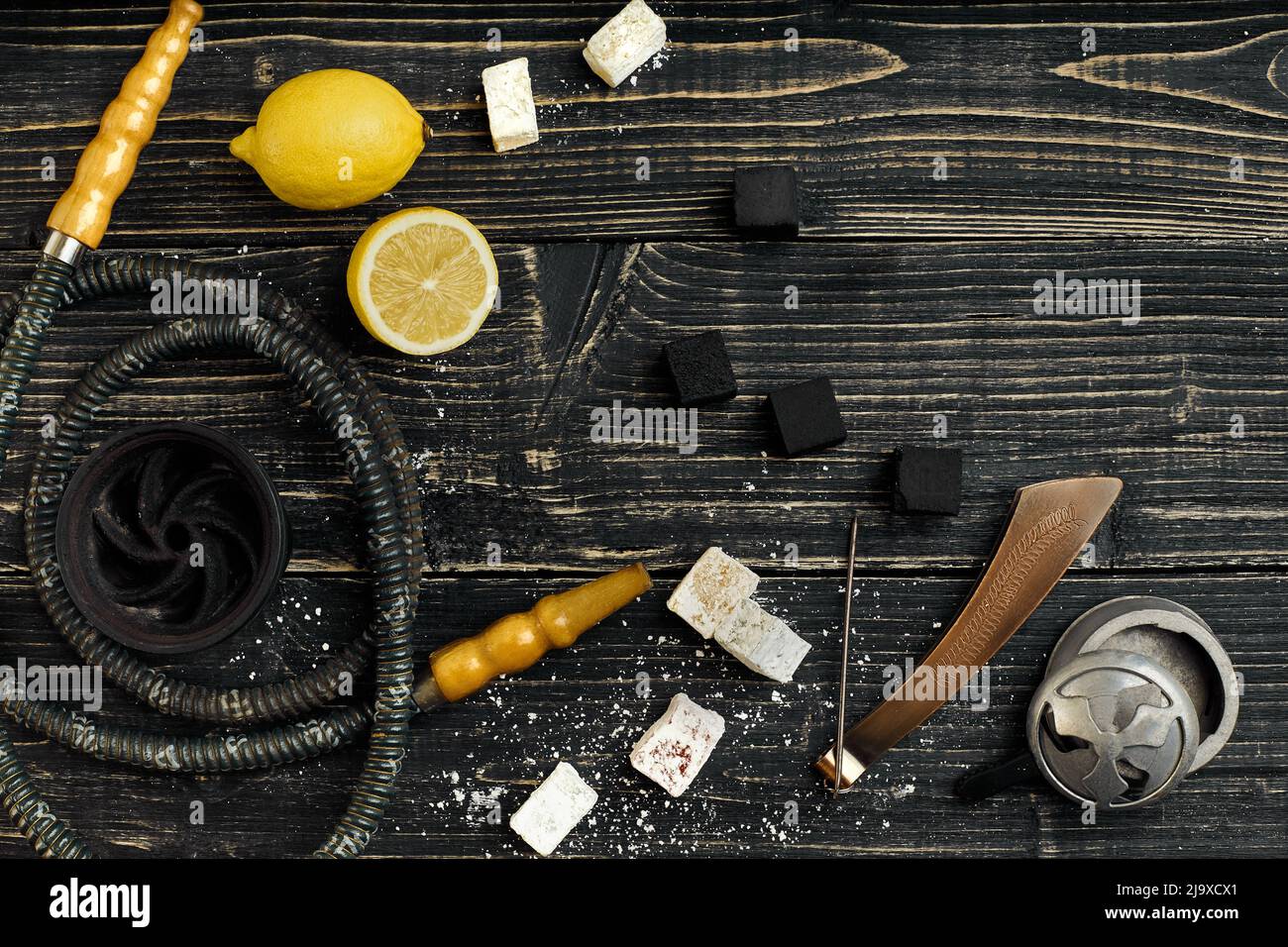 Arabic hookah with a tobacco flavor of a mixture of lemon. Top view of ...