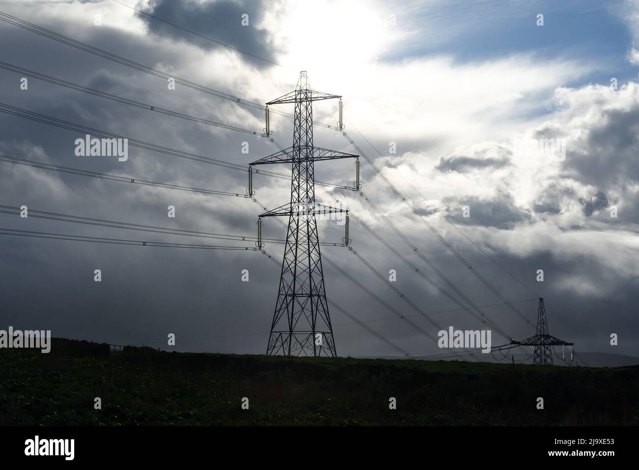Electricity pylons on the moors above Stocksbridge near Sheffield ...